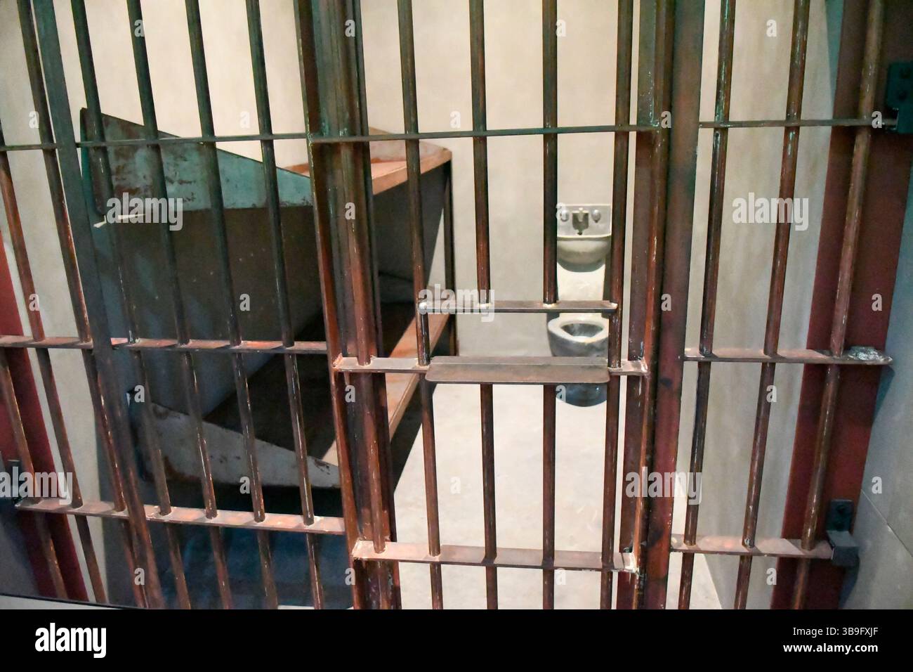 Bars in front of prison cell Stock Photo - Alamy