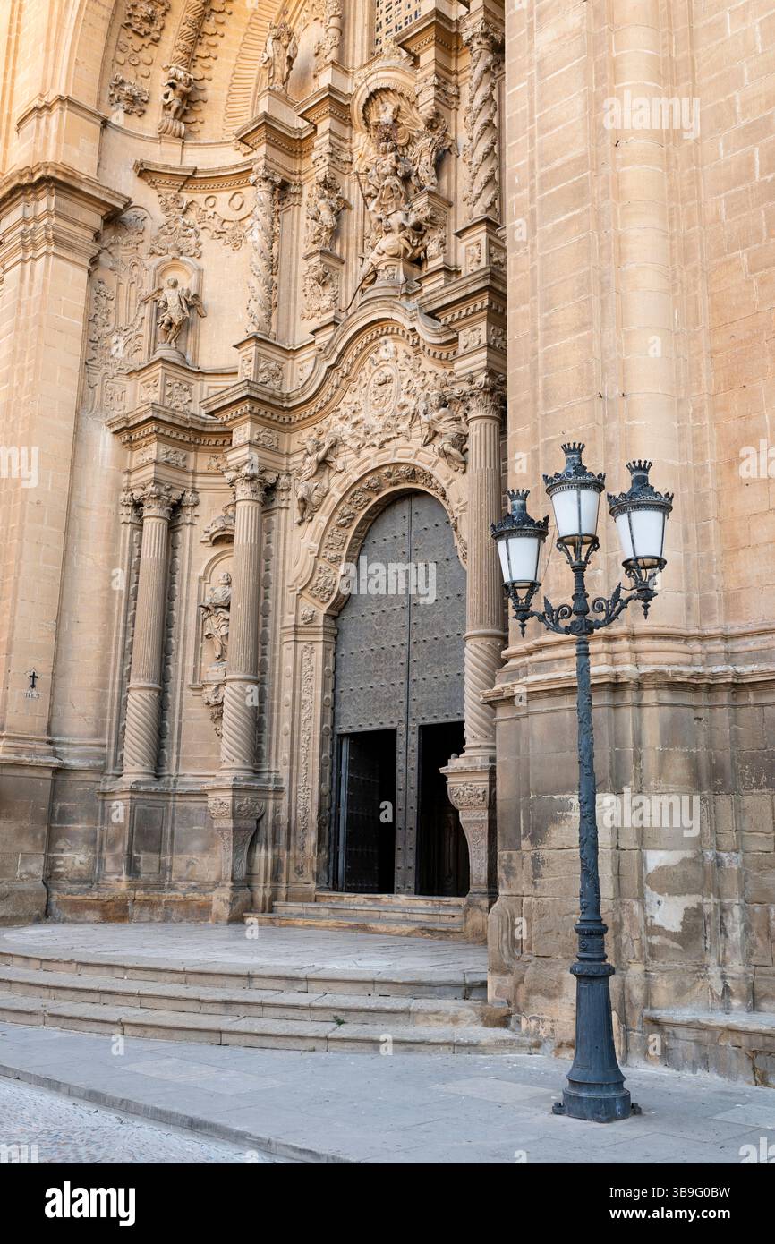 Front door and facade of the baroque roman catholic church in Alcaniz ...