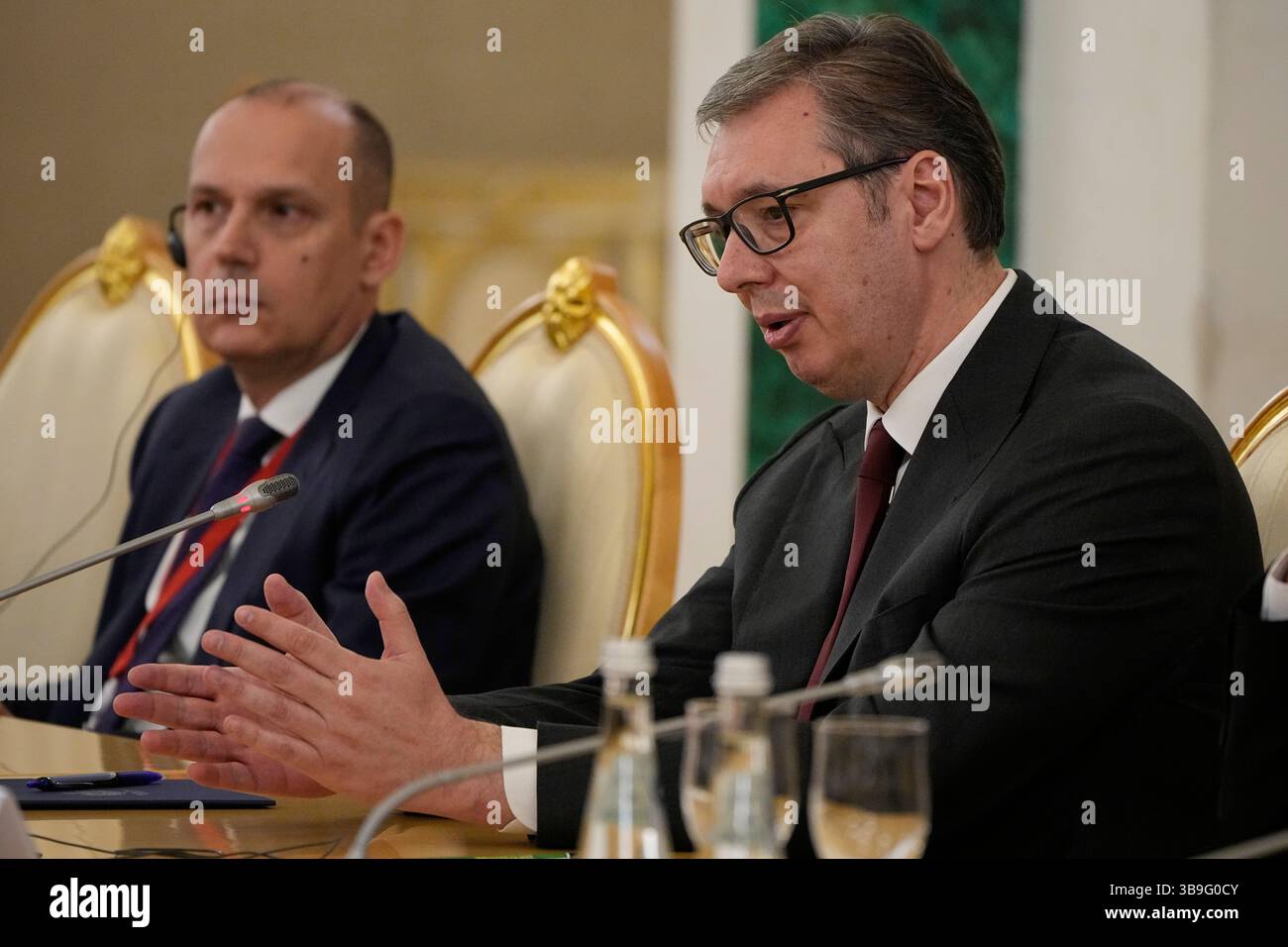 Serbia's President Aleksandar Vucic, right, attends his meeting with ...
