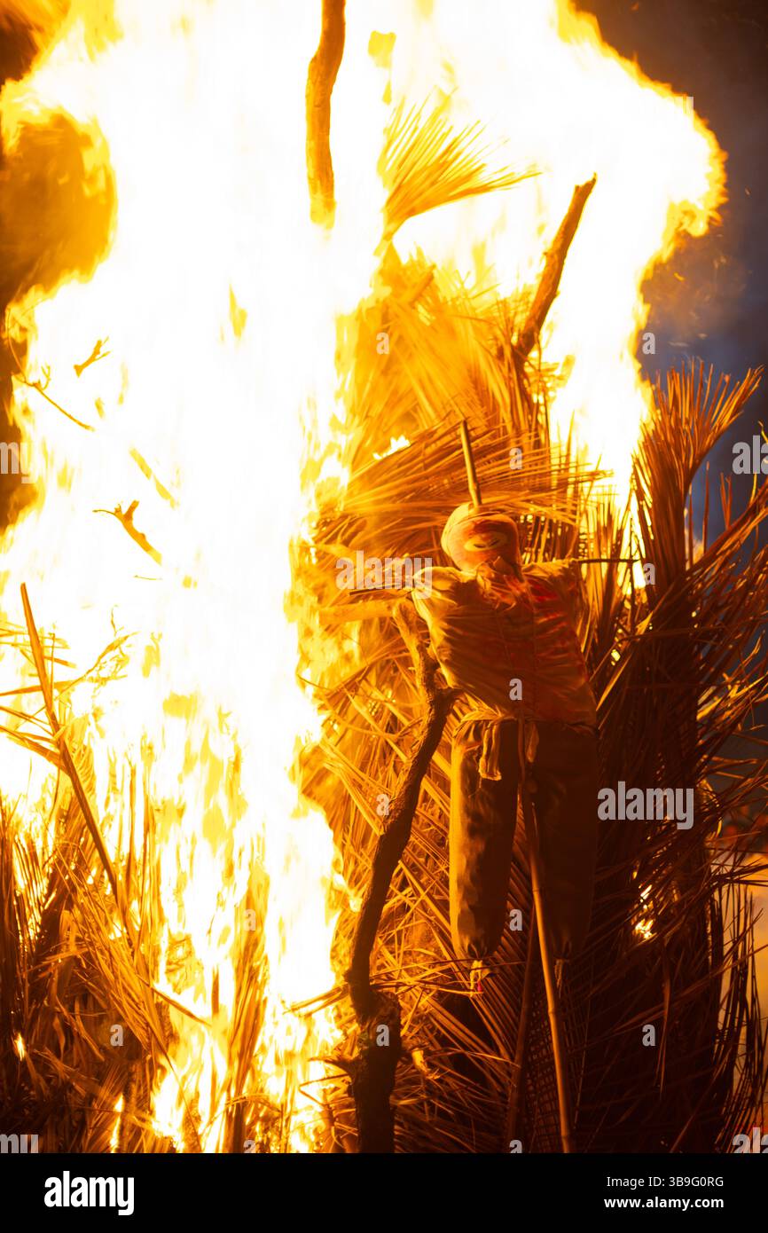 Holika Dahan, ritual bonfire and painting with colors on the evening ...