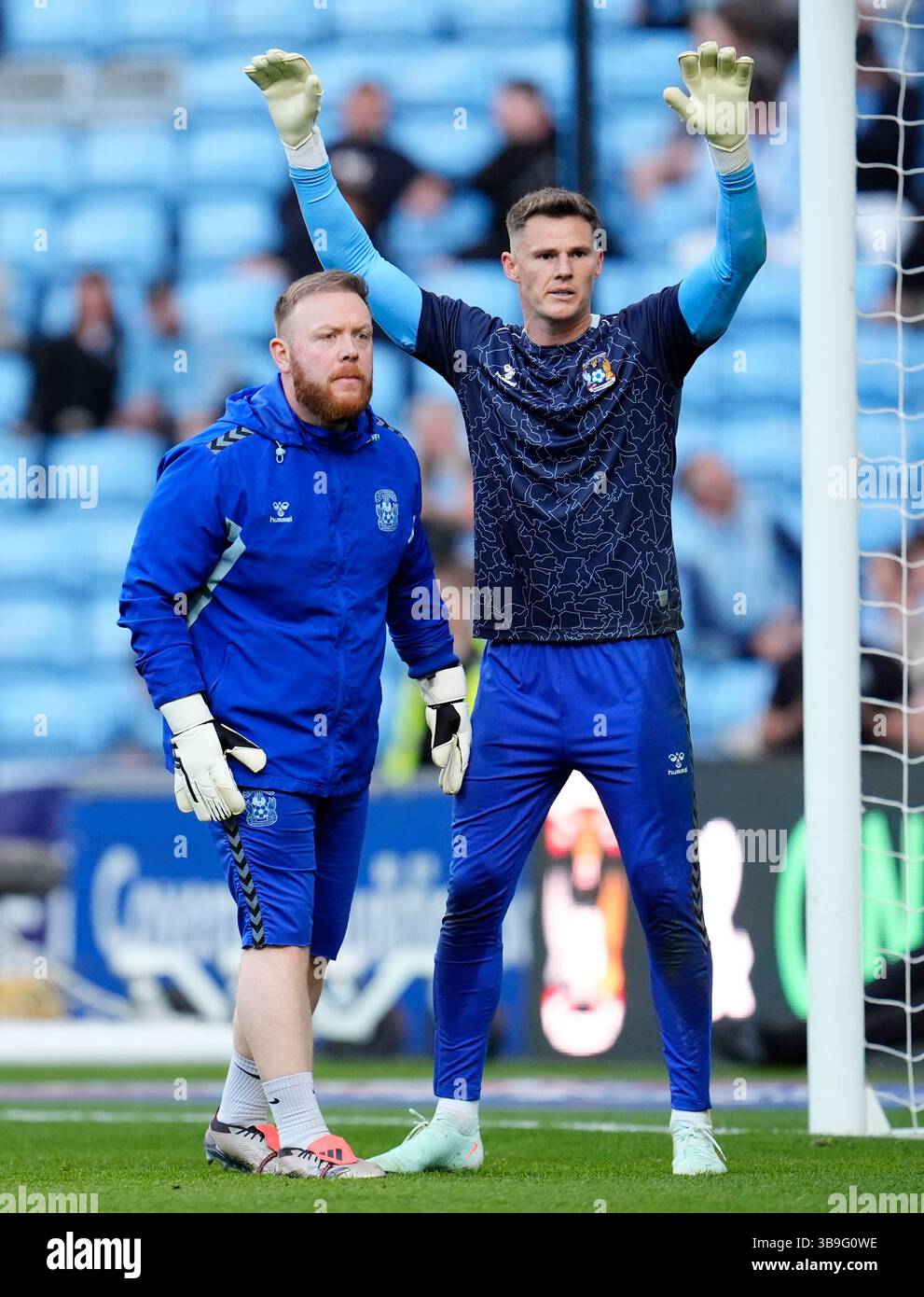 Coventry City goalkeeper Ben Wilson warming up ahead of the Sky Bet ...