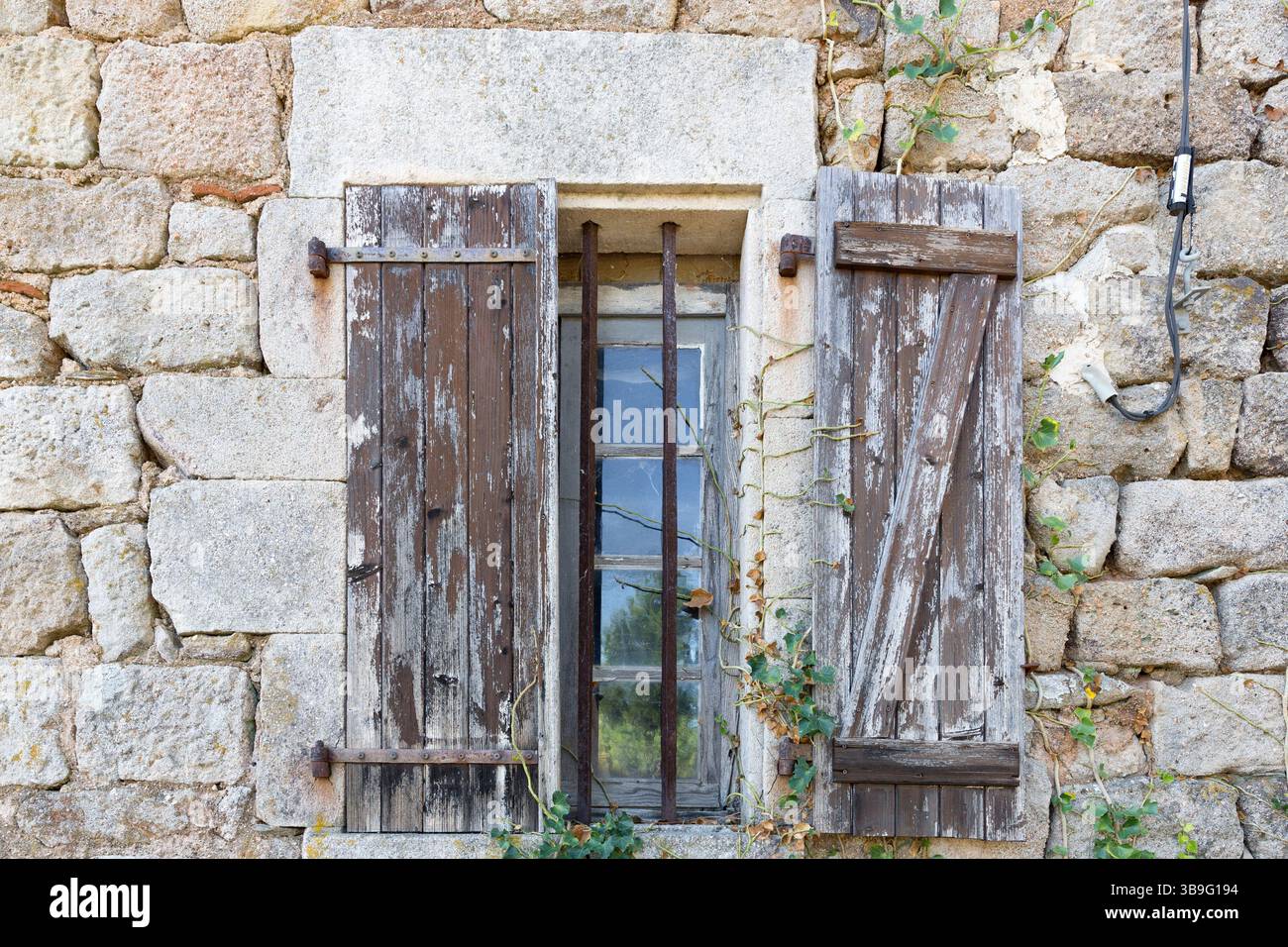 Windows on an old stone house in France Stock Photo - Alamy