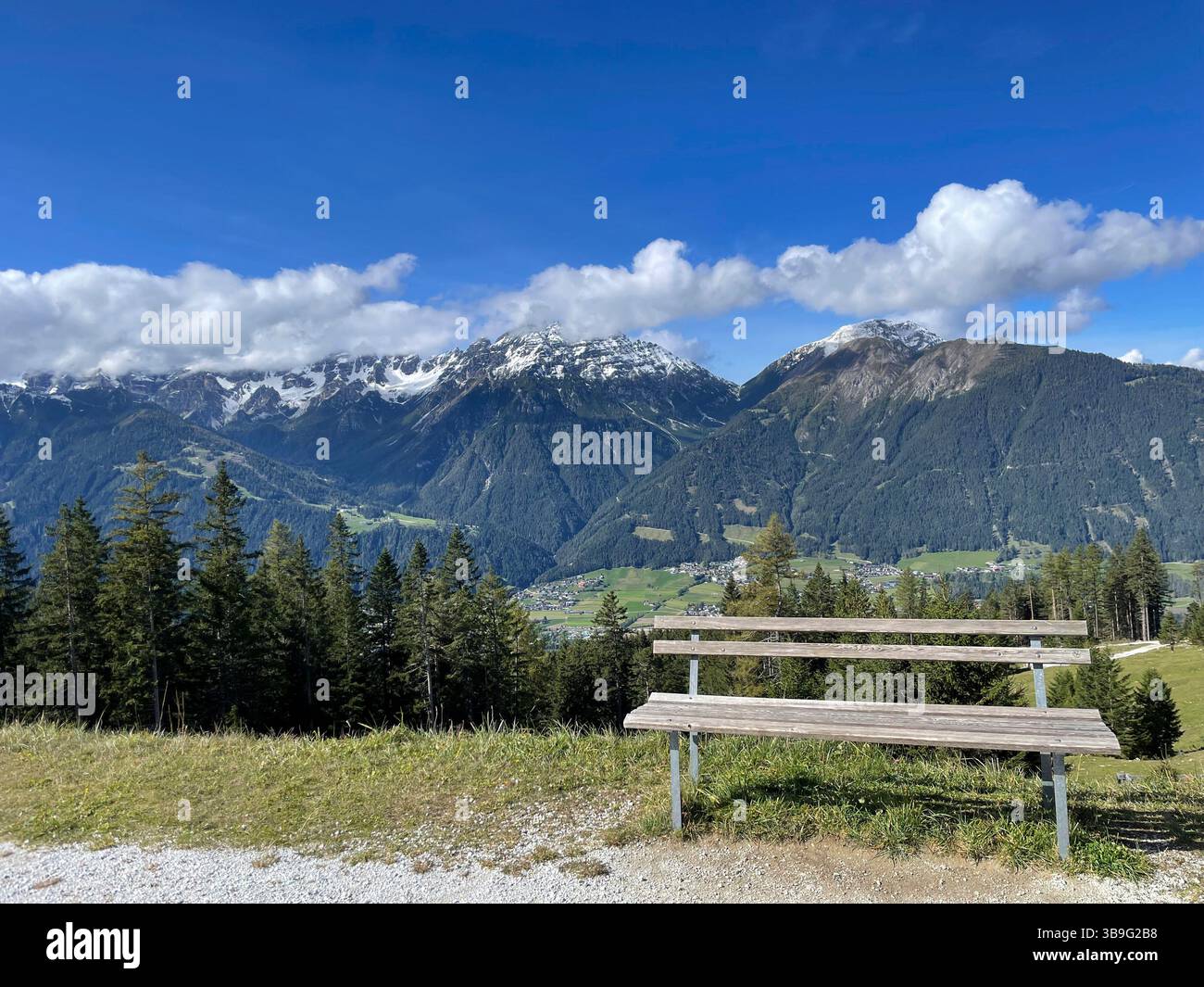 Viewing bench with a view of the Stubai Valley, the Kalkkögel and the ...