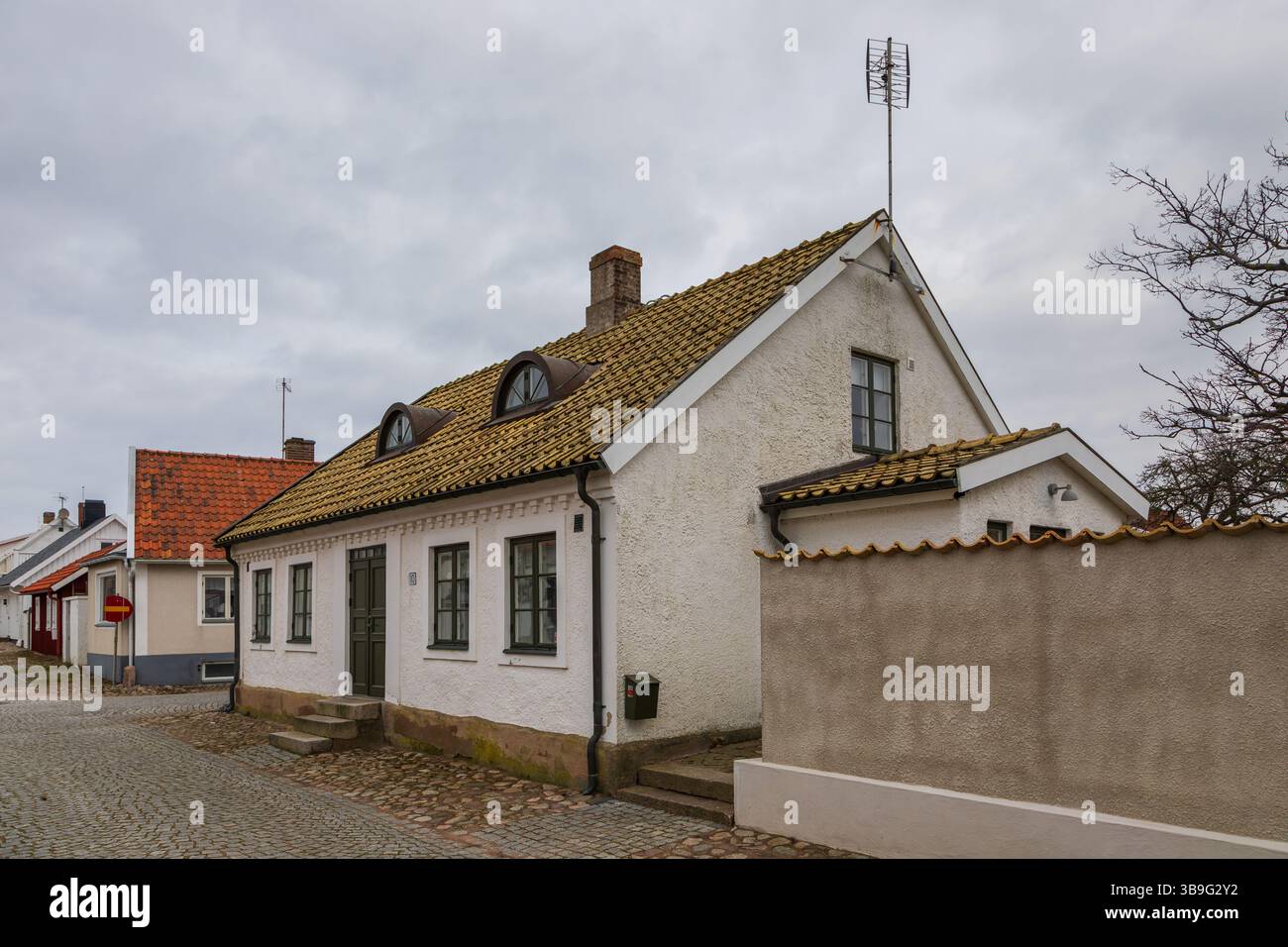 Colorful old houses and a peaceful residential street in the coastal ...