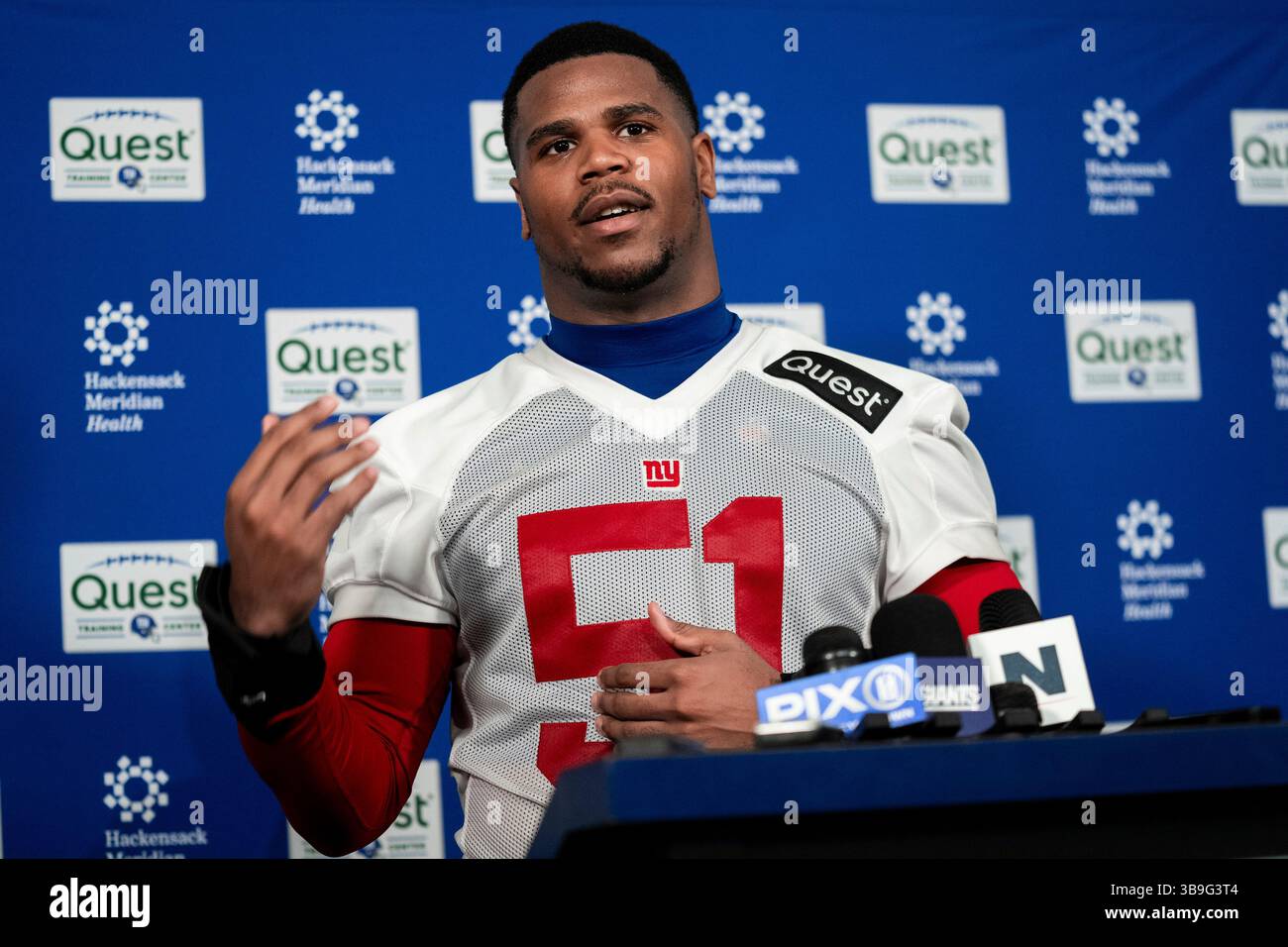 New York Giants linebacker Abdul Carter (51) speaks at a press ...