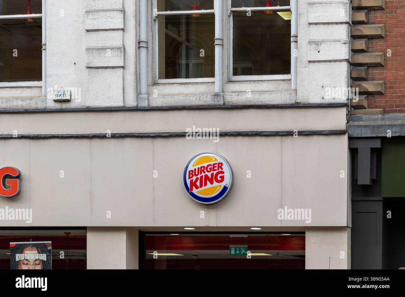 Exterior shot of a Burger King restaurant facade featuring the brand ...