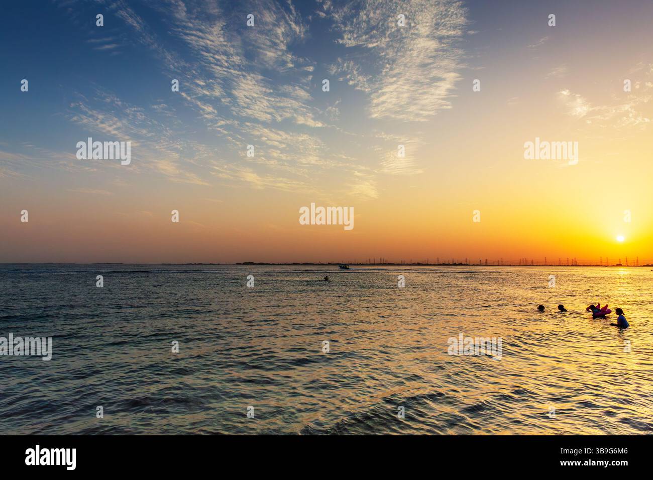 Golden Hues Over Halfmoon Beach – A Saudi Arabian Sunset Stock Photo ...