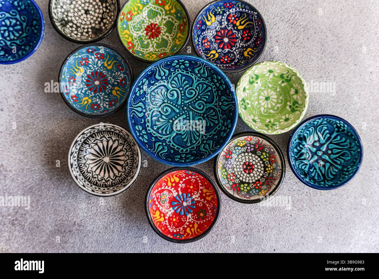 Top view of vibrant, handcrafted ceramic bowls with intricate patterns ...