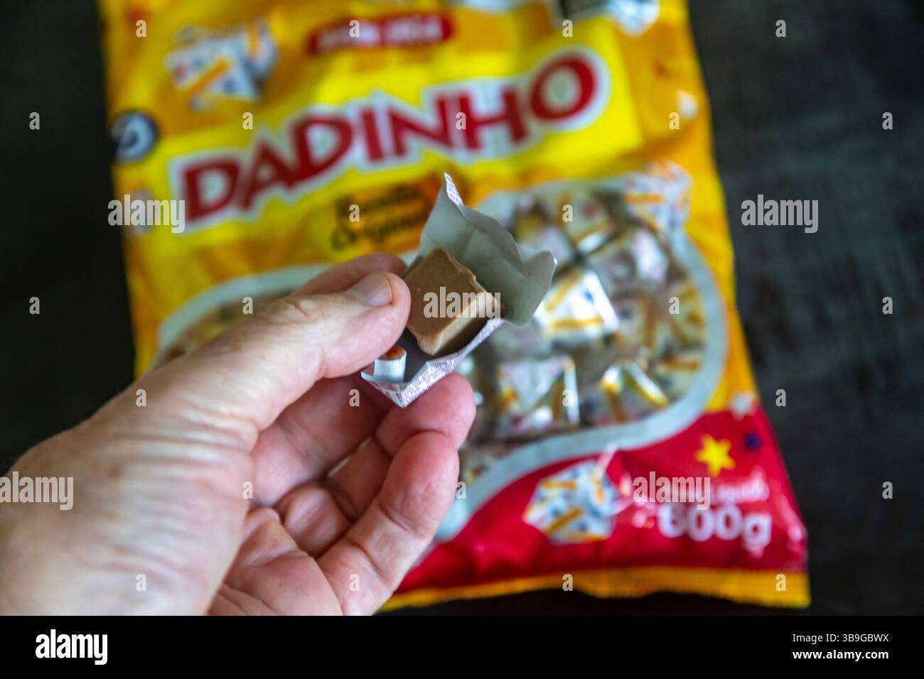Traditional and original peanut candy known in Brazil as Dadinho. Made ...