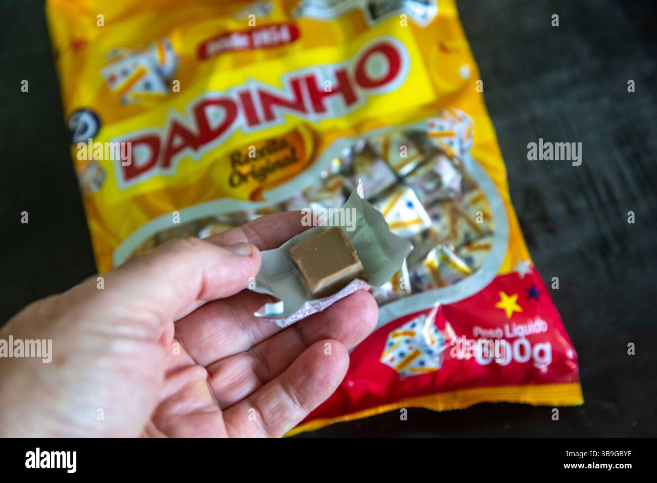 Traditional and original peanut candy known in Brazil as Dadinho. Made ...