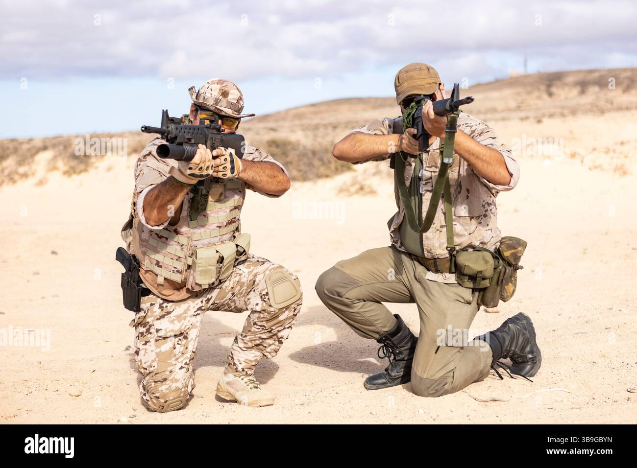 Anonymous military man aiming rifle hi-res stock photography and images ...