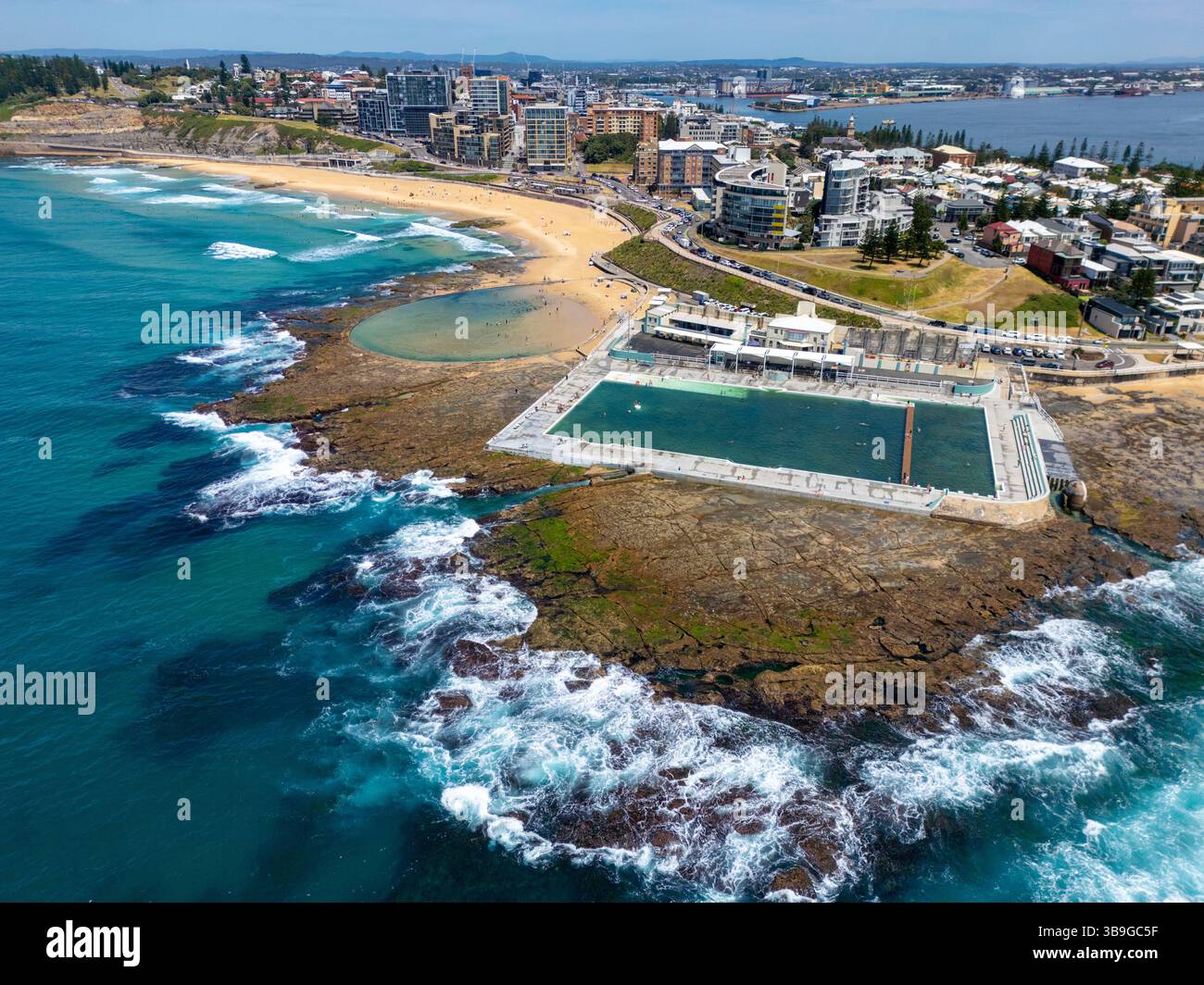 Aerial view of a picturesque coastal pool and neighboring beach in New ...