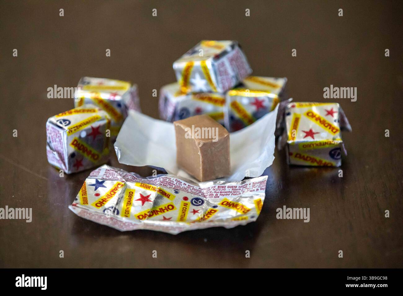 Traditional and original peanut candy known in Brazil as Dadinho. Made ...