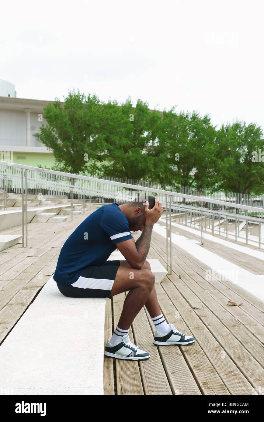 Athlete in recovery contemplating hi-res stock photography and images ...