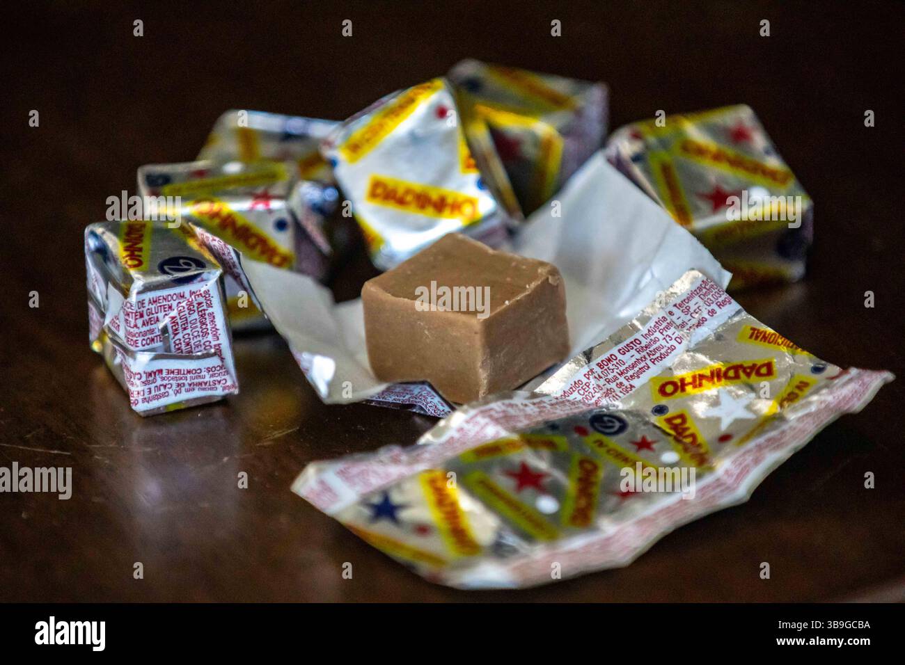 Traditional and original peanut candy known in Brazil as Dadinho. Made ...