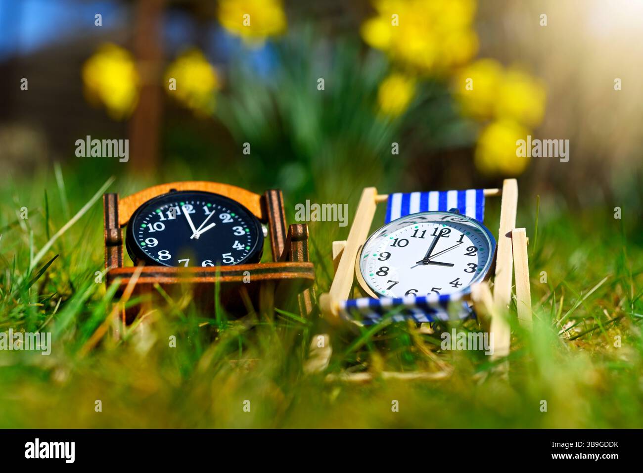 White clock in a deck chair and black clock in a rocking chair ...