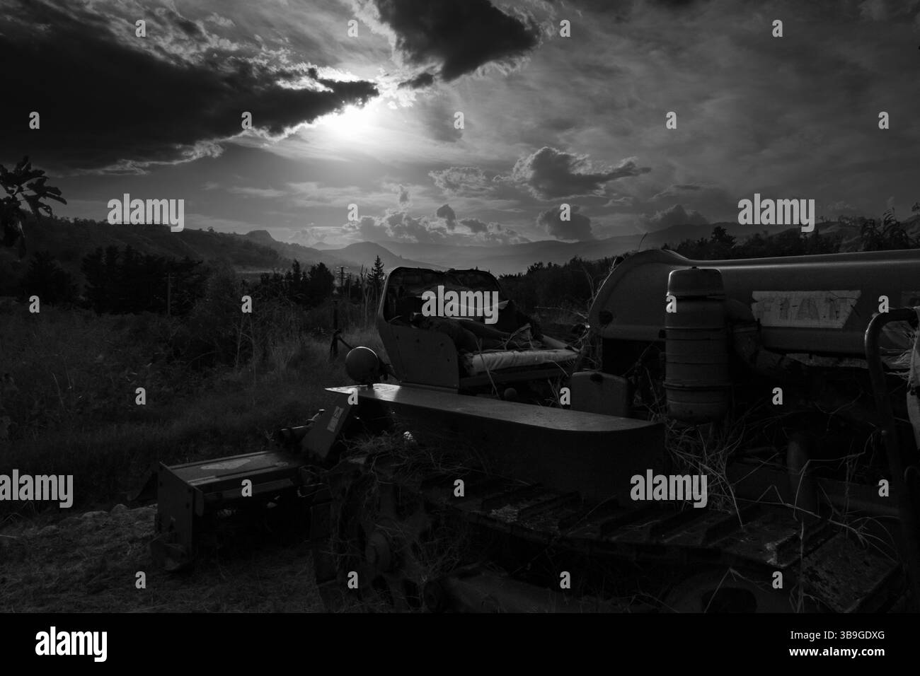 Landscape with tractor in black and white Stock Photo - Alamy