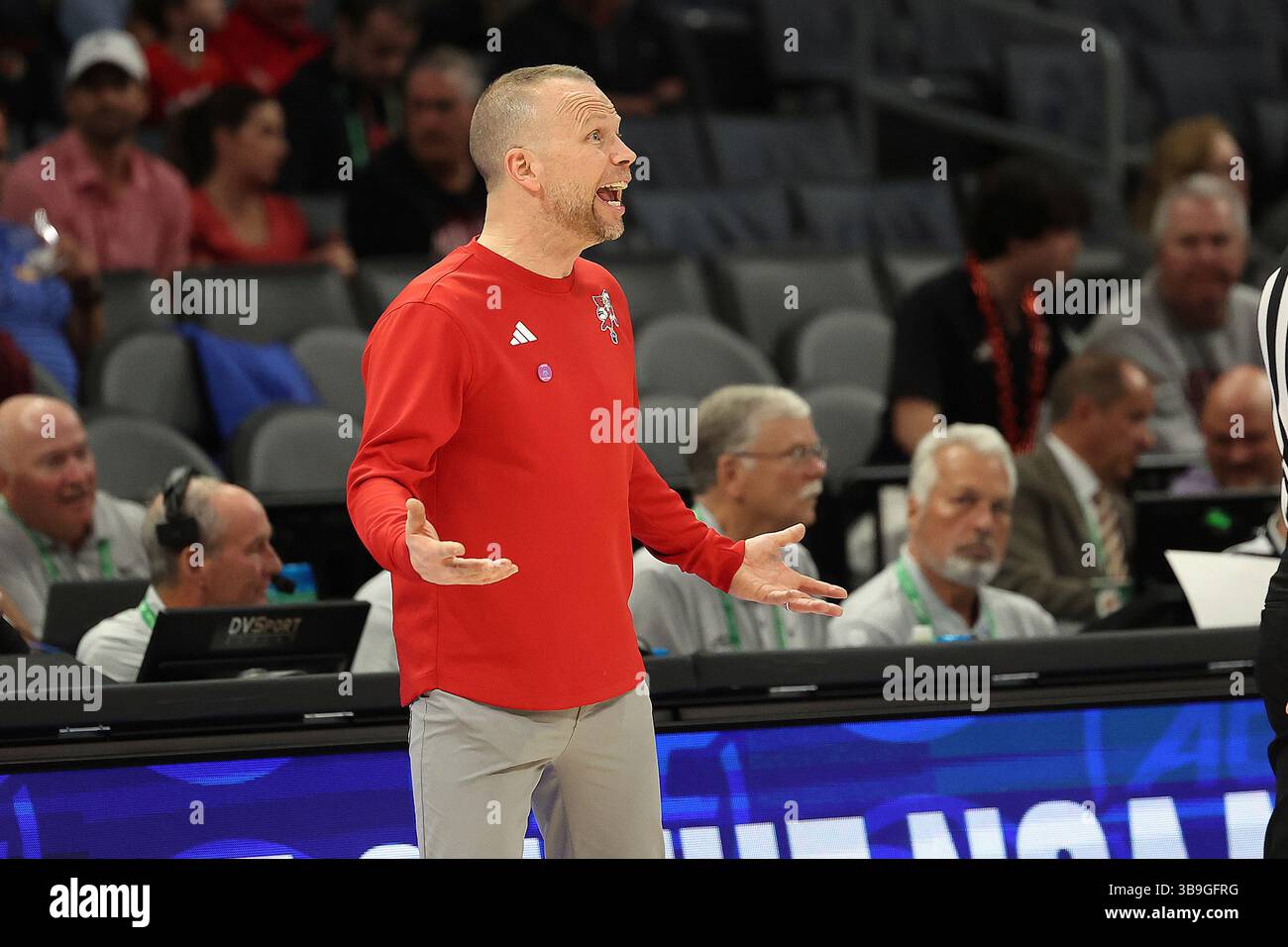 CHARLOTTE, NC - MARCH 13: Louisville Cardinals head coach Pat Kelsey ...