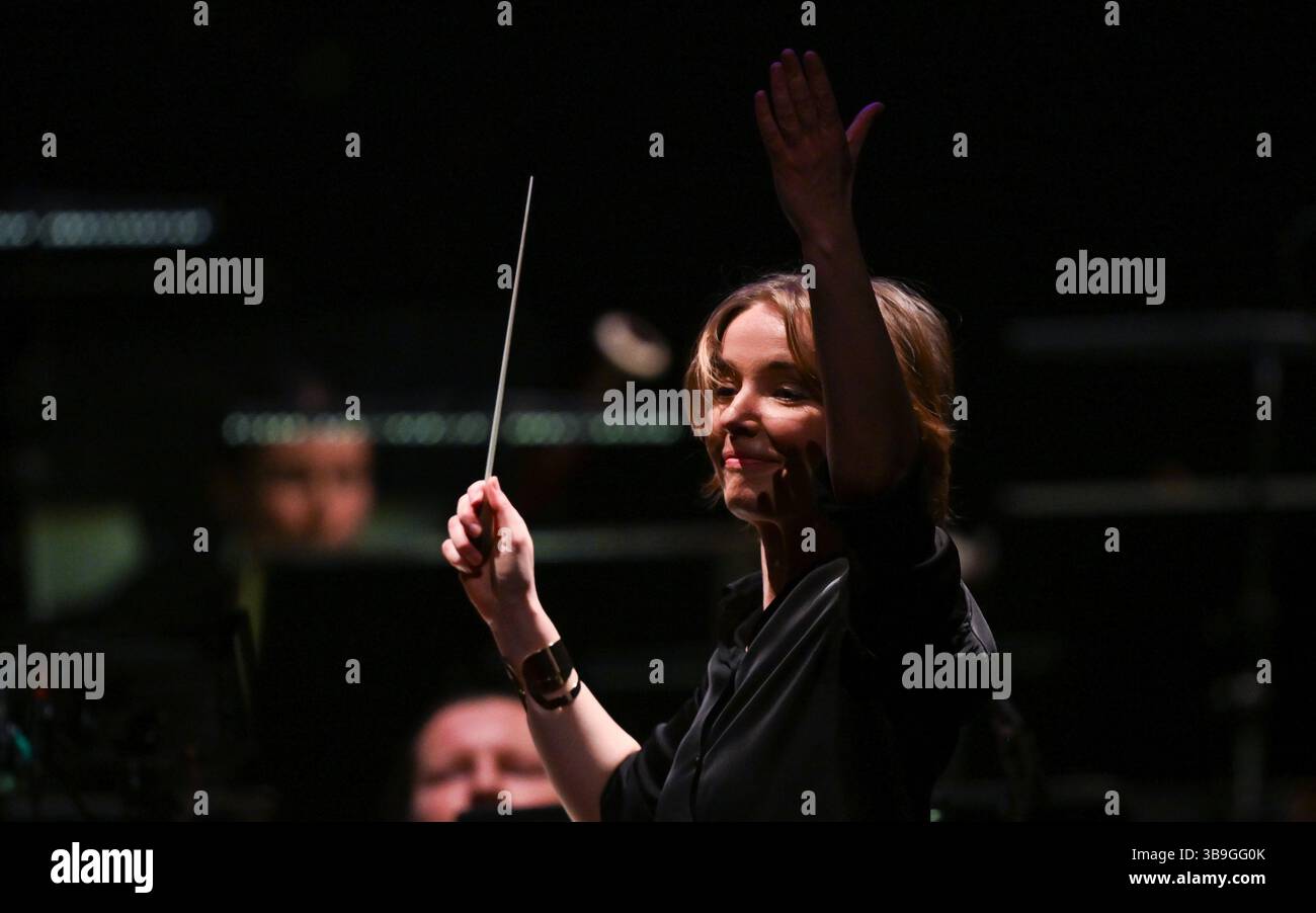 Chemnitz, Germany. 09th May, 2025. Russian conductor Anna Rakitina ...