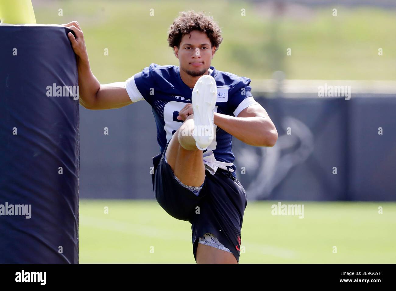 Houston Texans wide receiver Jayden Higgins stretches during the NFL ...