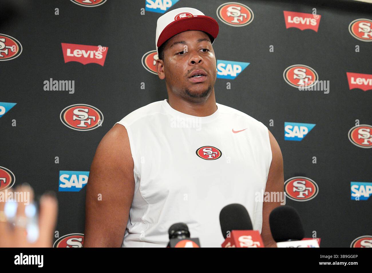 San Francisco 49ers defensive tackle Alfred Collins speaks to the media at the NFL football team ...