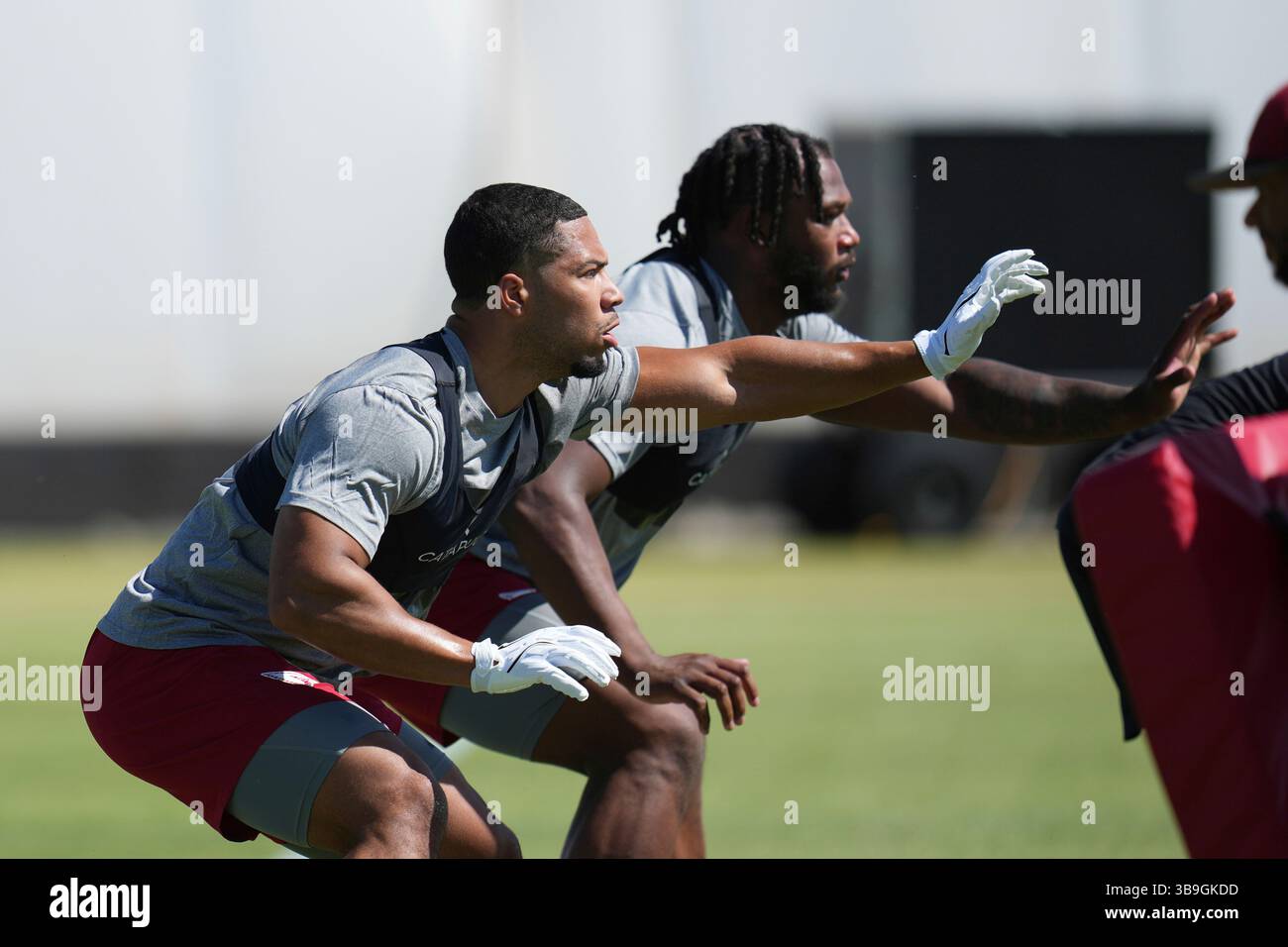 Arizona Cardinals rookie linebackers Cody Simon, left, and Jordan Burch ...