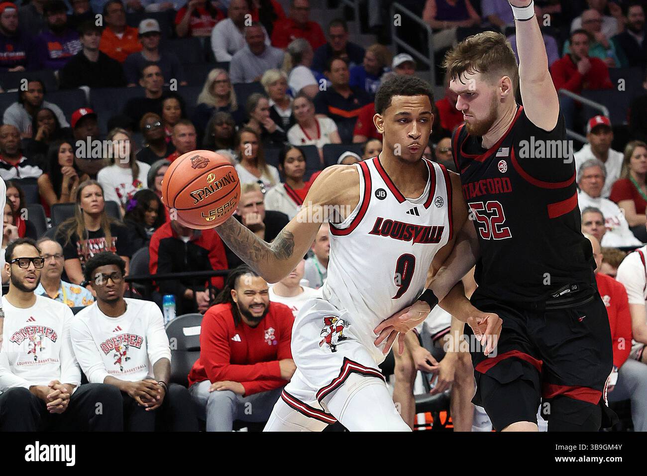 CHARLOTTE, NC - MARCH 13: Louisville Cardinals forward Khani Rooths (9 ...