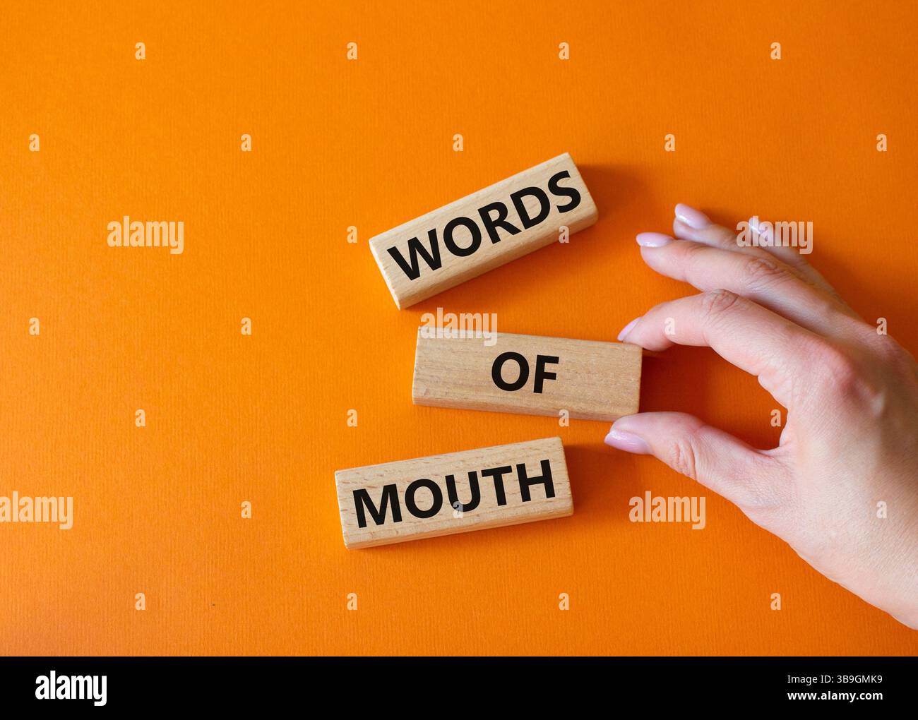 Words of mouth symbol. Concept word Words of mouth on wooden blocks ...