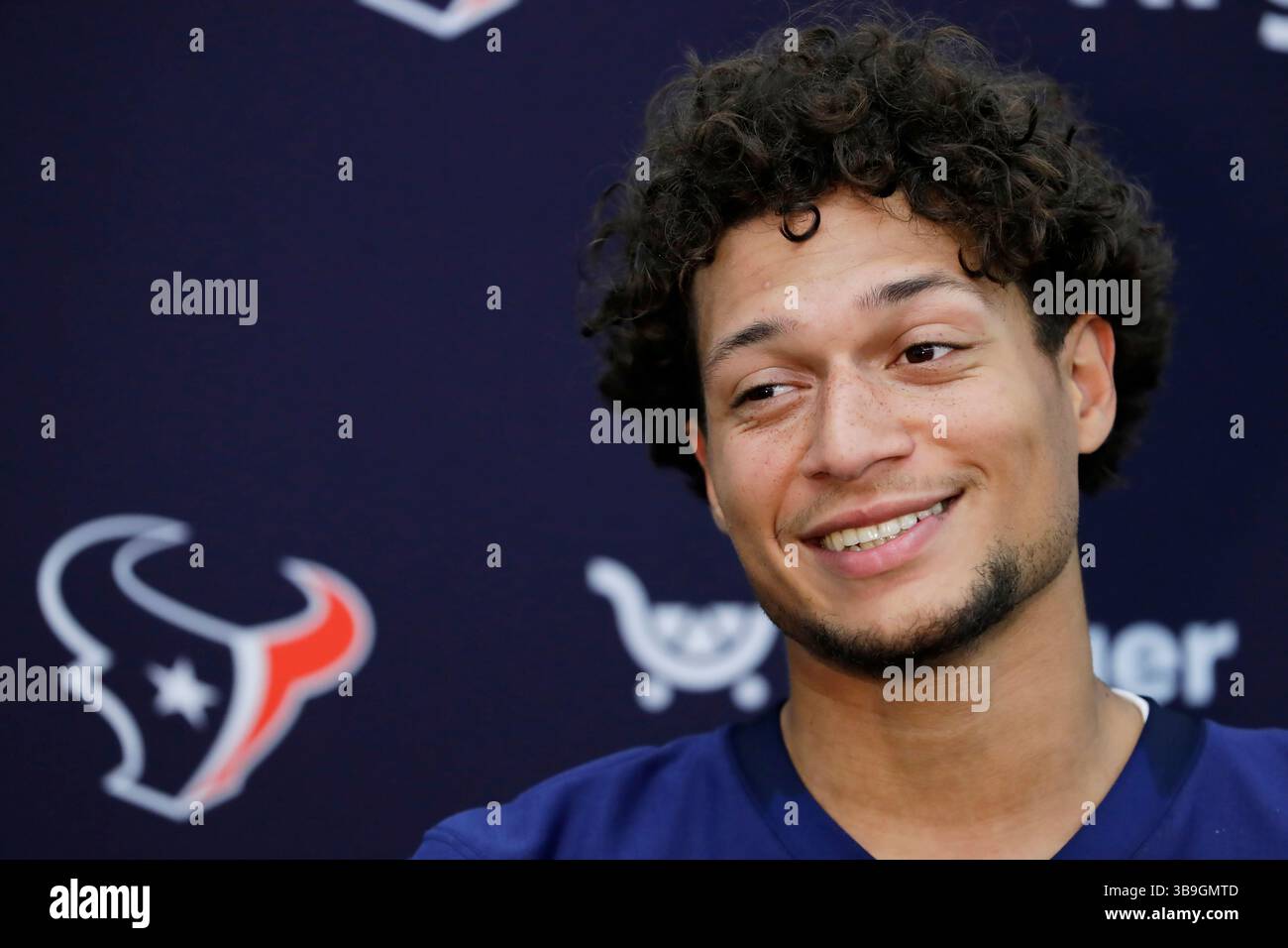 Houston Texans wide receiver Jayden Higgins answers questions during a ...
