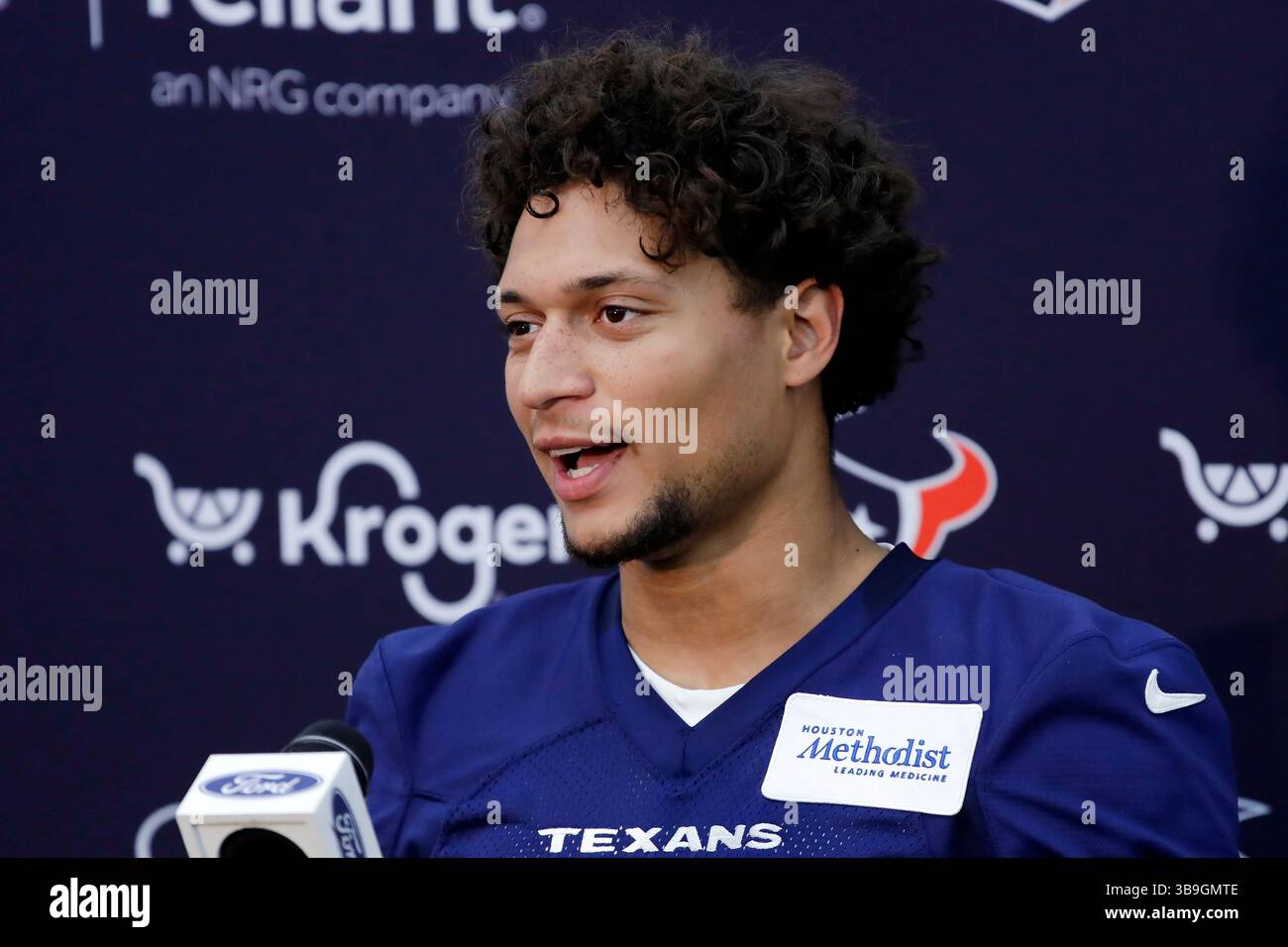 Houston Texans wide receiver Jayden Higgins answers questions during a ...