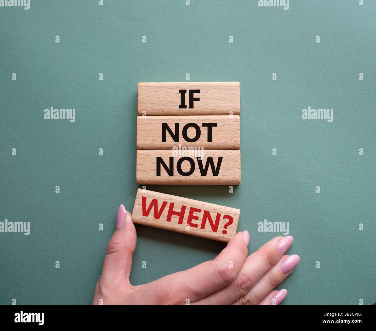 If not now when symbol. Concept words If not now when on wooden blocks ...