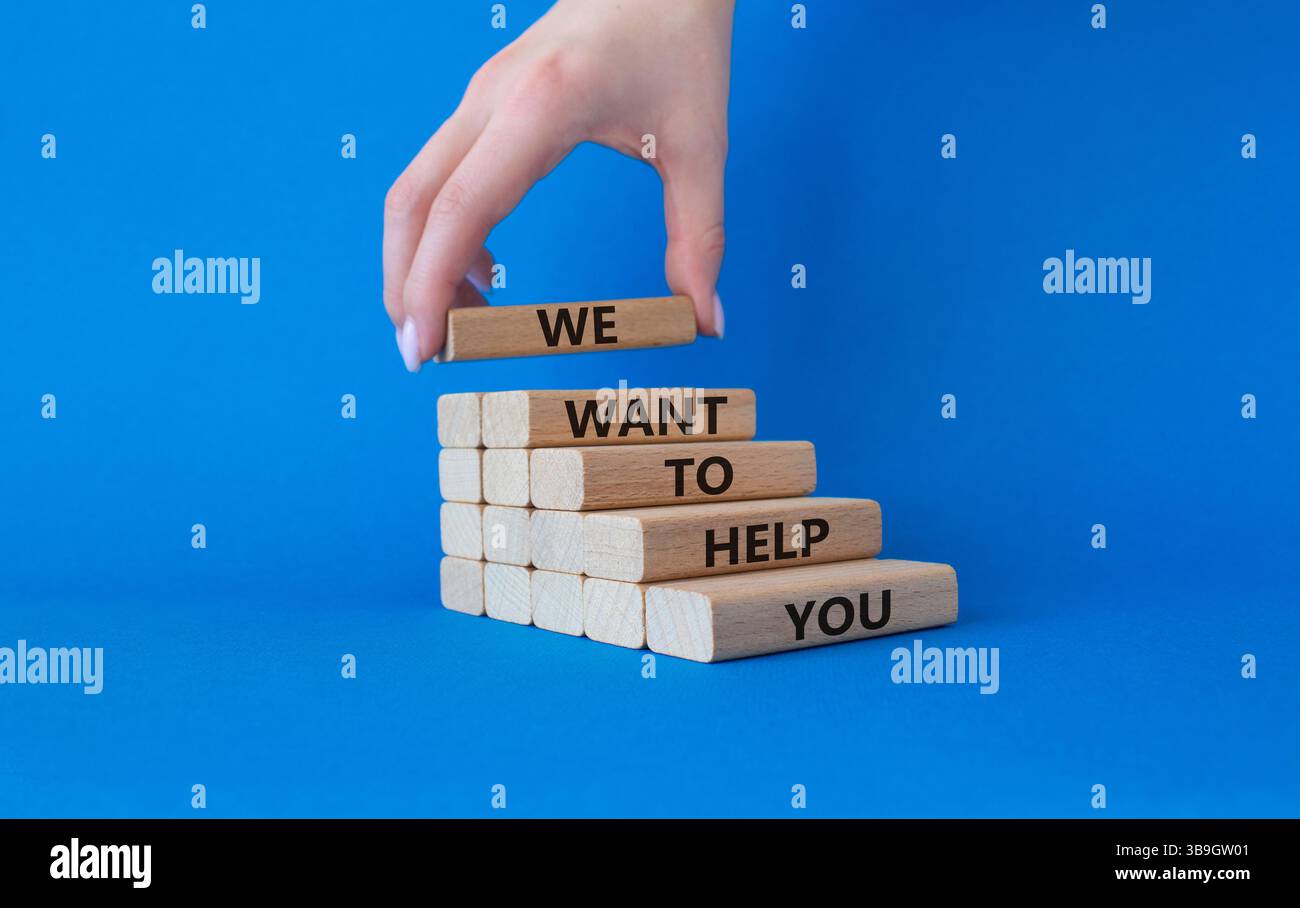 We want to help you symbol. Wooden blocks with words We want to help ...