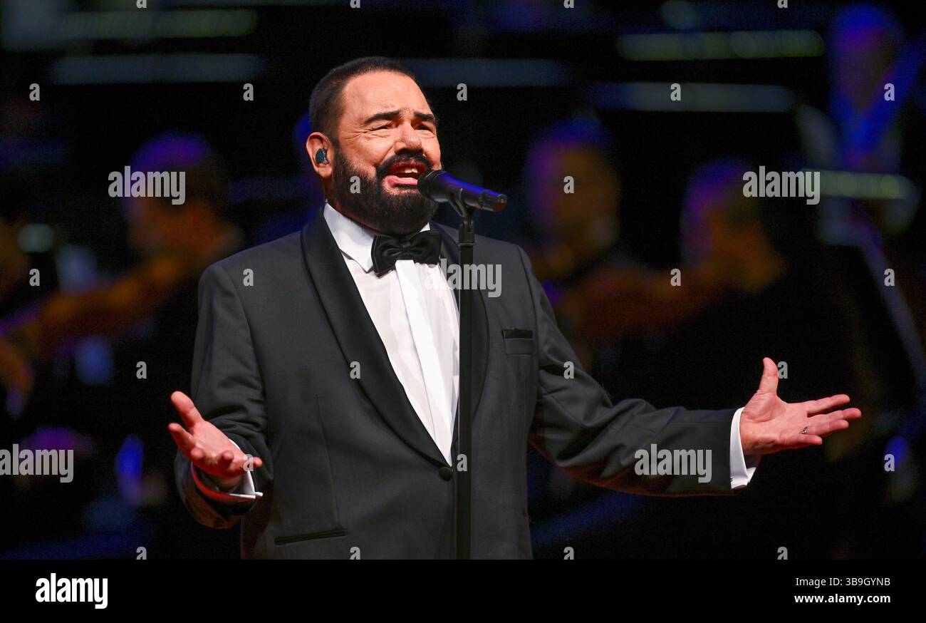 Chemnitz, Germany. 09th May, 2025. German singer Marian Gold sings with ...