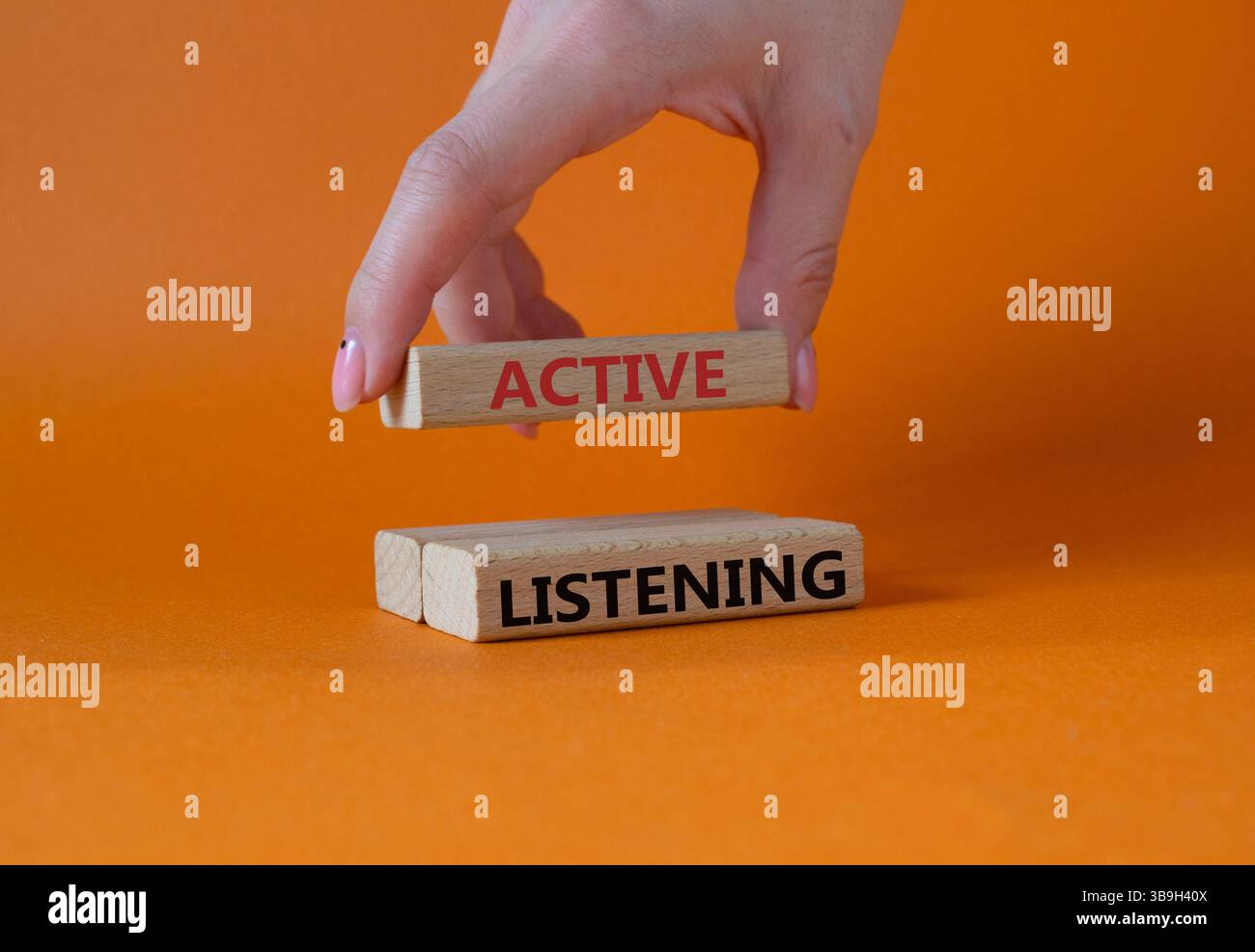 Active listening symbol. Wooden blocks with words Active listening ...