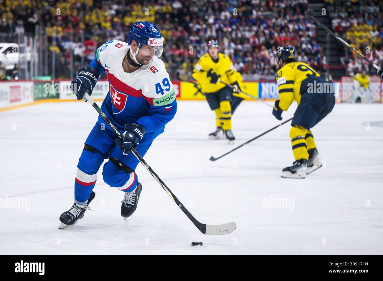 Samuel Takac of, Slovakia. , . during the 2025 IIHF Ice Hockey World ...