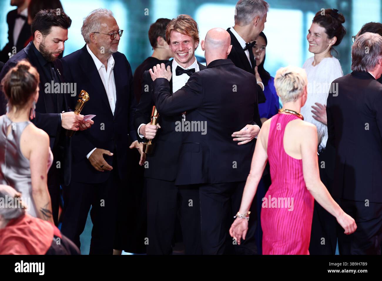 Berlin, Germany. 09th May, 2025. Director Tim Fehlbaum (M) and his team ...
