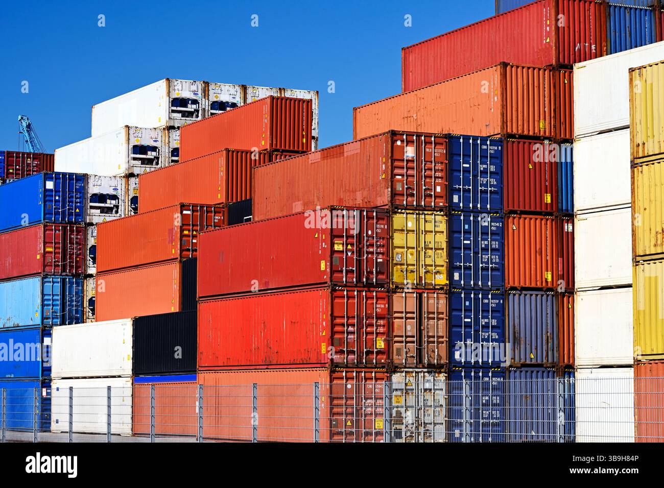 Stacked containers in the port of Hamburg, Germany Stock Photo - Alamy