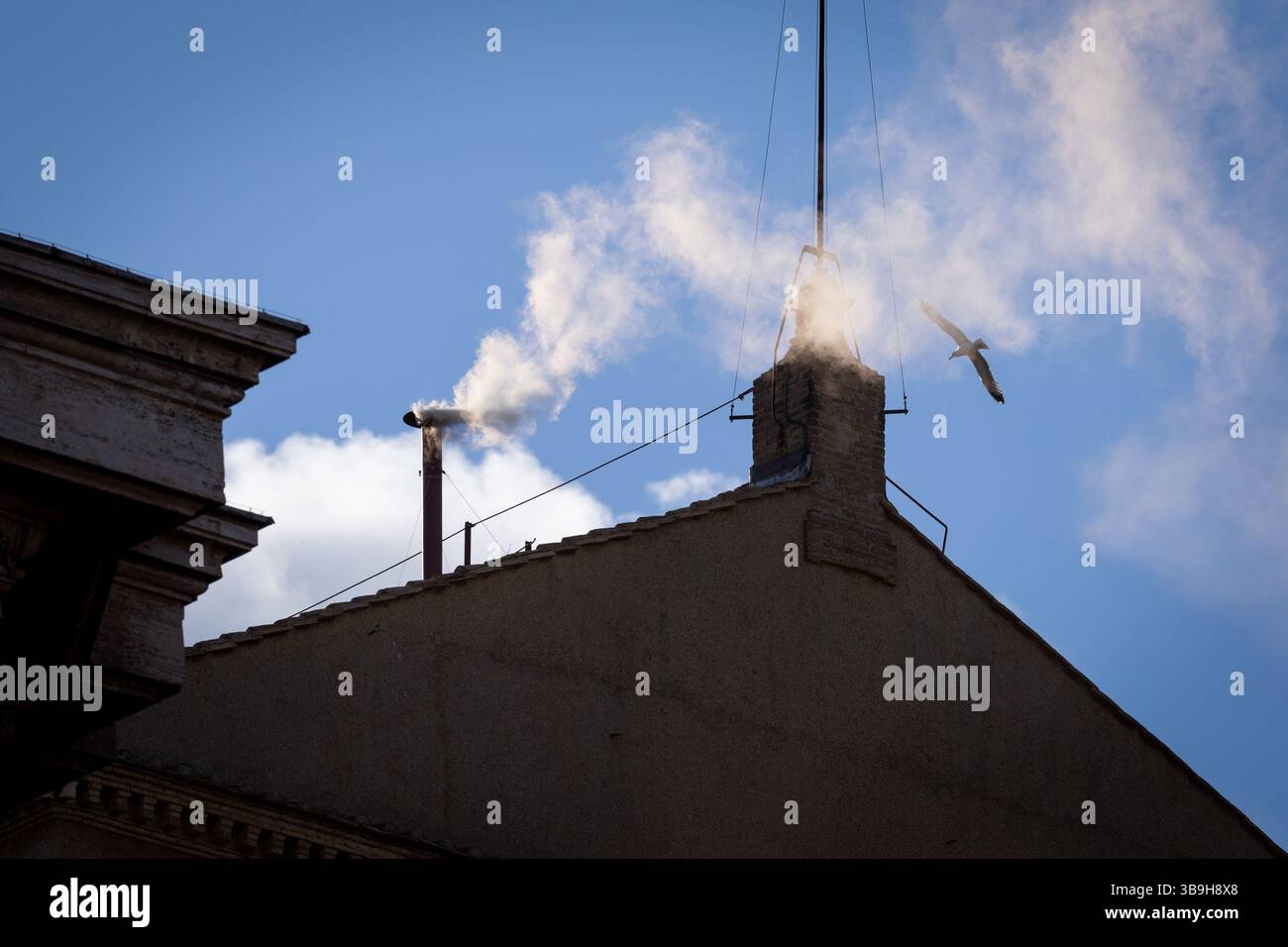 Vatican, Vatican. 08th May, 2025. White smoke billows from the Sistine ...