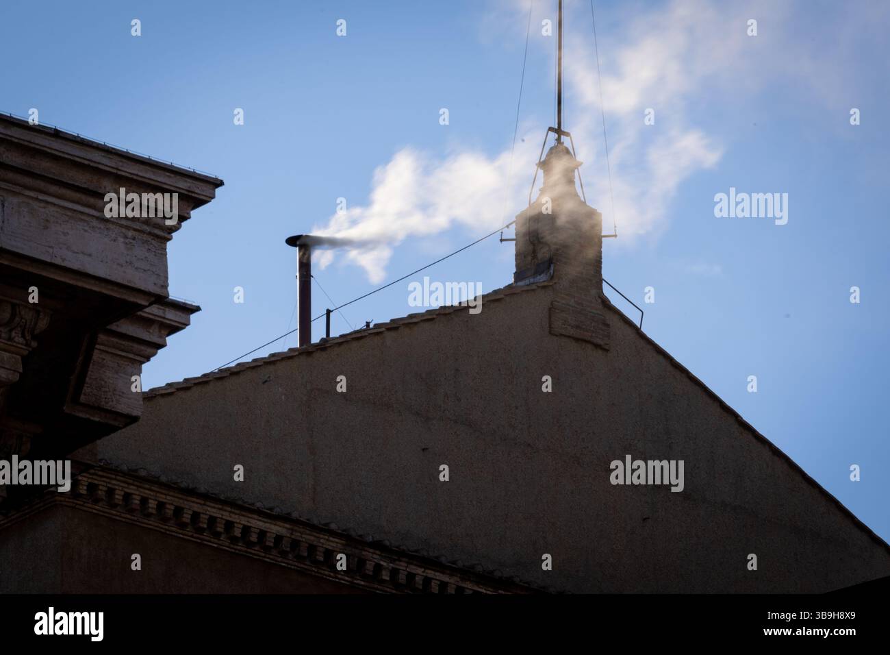 Vatican, Vatican. 08th May, 2025. White smoke billows from the Sistine ...
