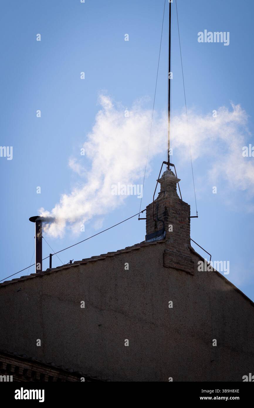 Vatican, Vatican. 08th May, 2025. White smoke billows from the Sistine ...