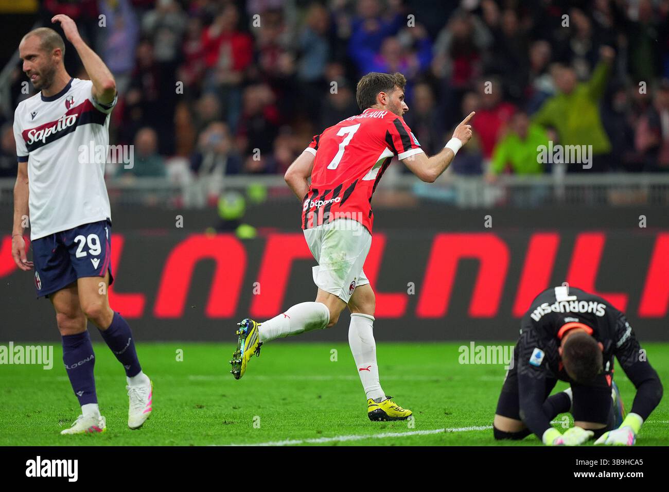 AC Milan's Santiago Gimenez celebrates after scoring 3-1 during the ...