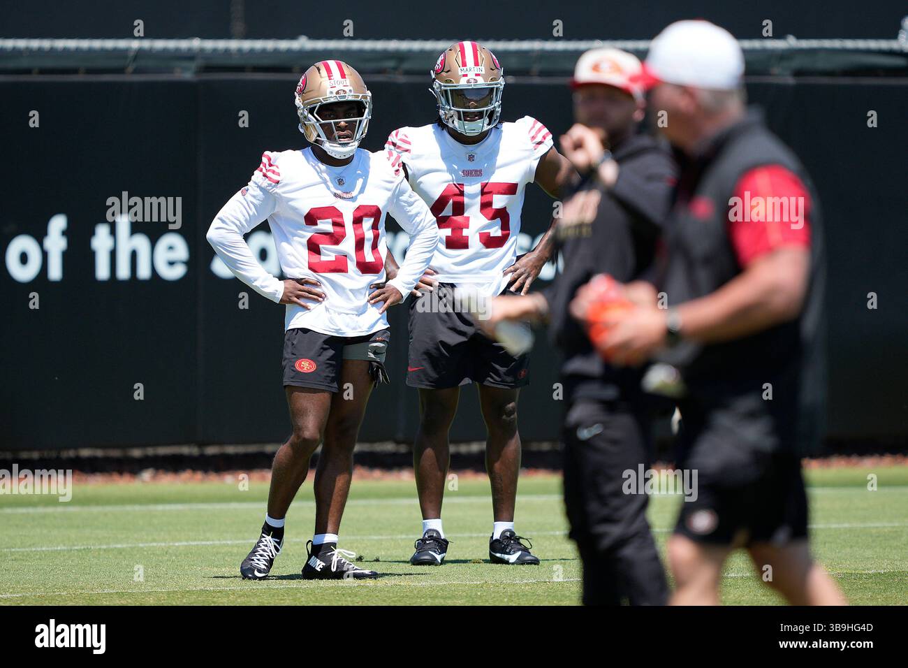San Francisco 49ers cornerback Upton Stout (20) and linebacker Nick ...