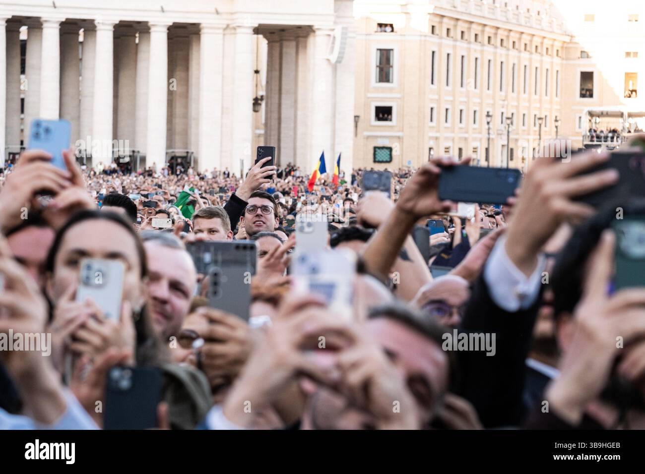 Faithful eagerly capture the historic moment on their phones as the new ...