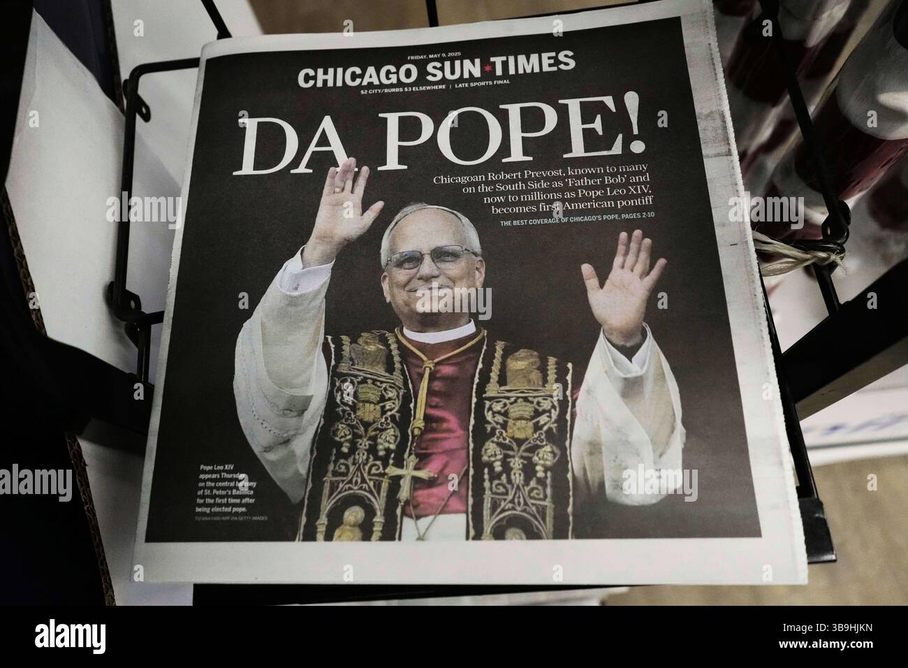 A Chicago Sun-Times newspaper front page shows "DA POPE!" at a grocery ...