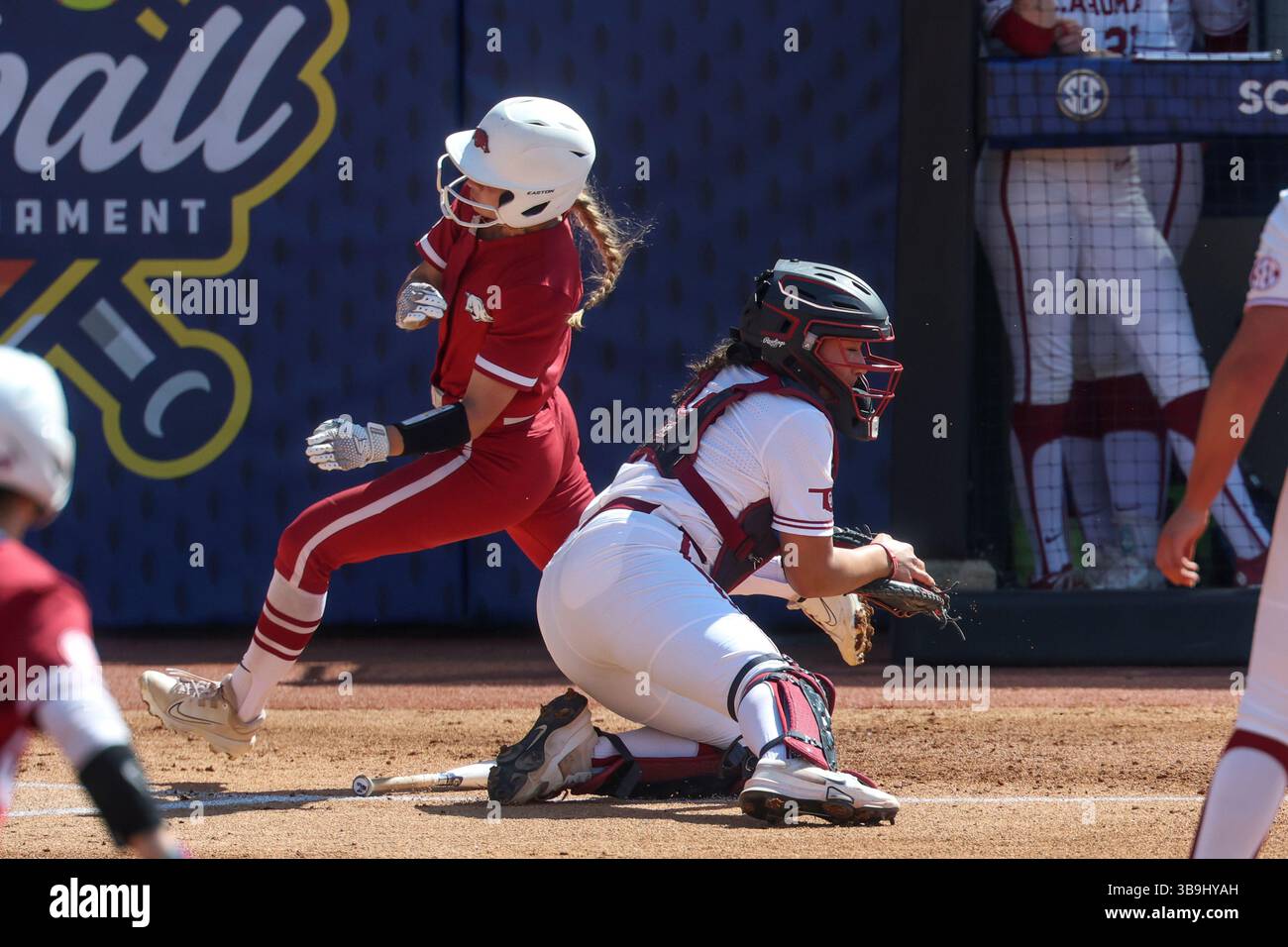 ATHENS, GA - MAY 09: Arkansas utility Raigan Kramer (1) scores around ...