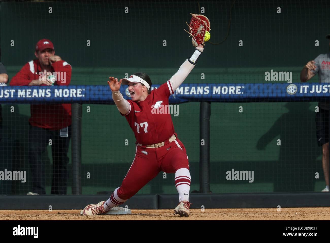 ATHENS, GA - MAY 09: Arkansas infielder Bri Ellis (77) holds up the ...