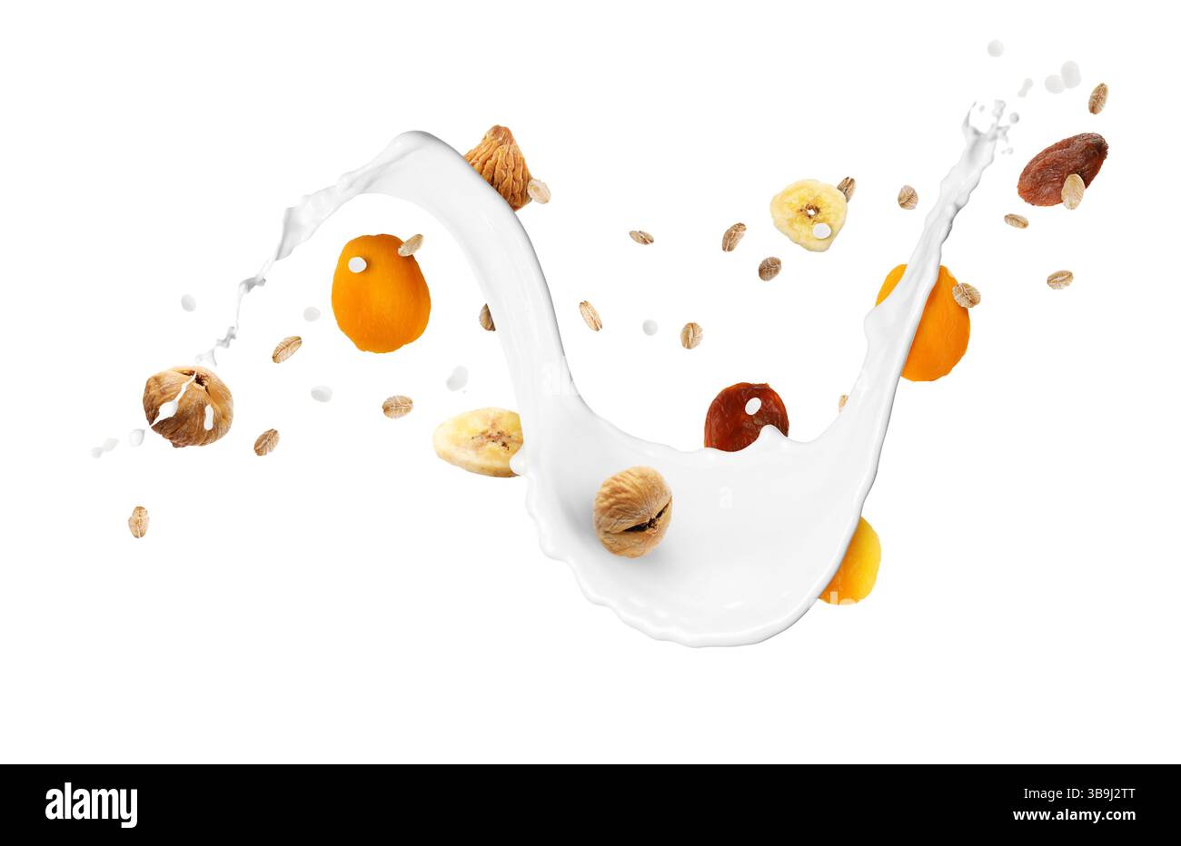 Milk splash with oat flakes and dried fruits in air on white background ...