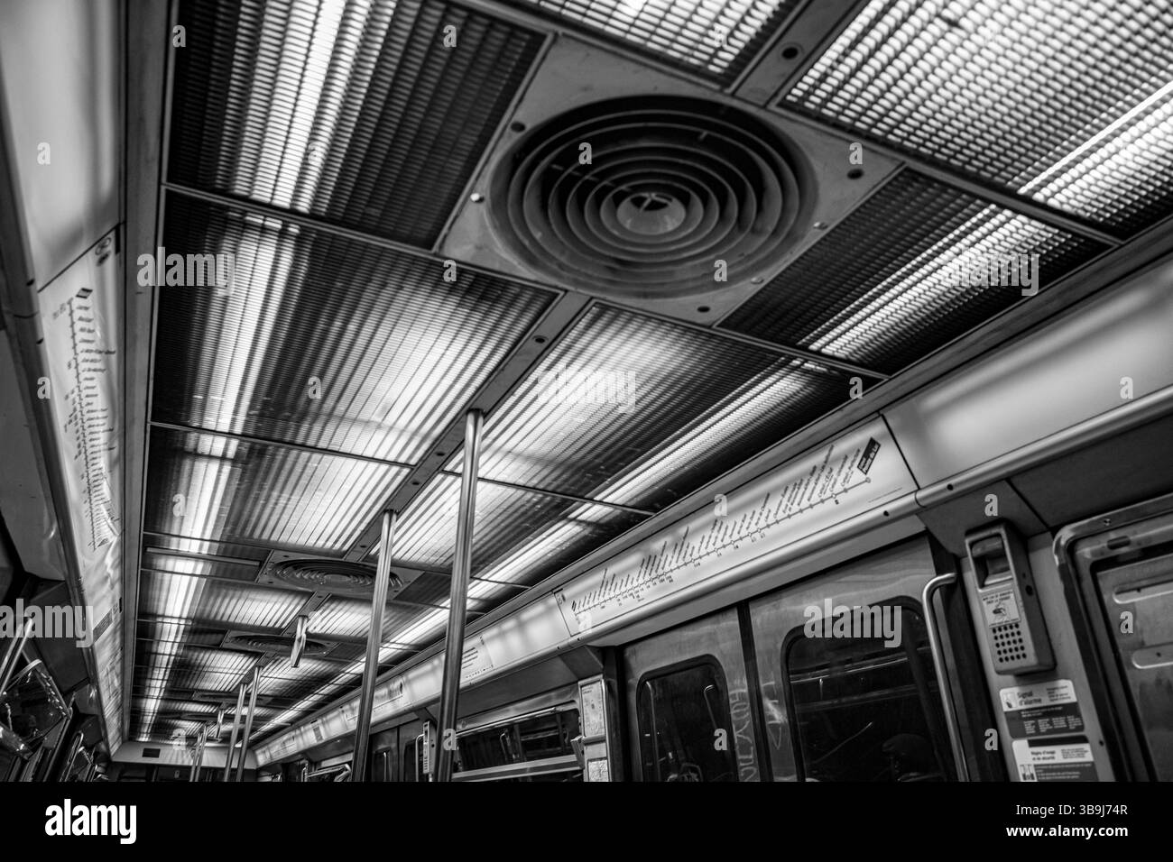 Inside a metro car Black and White Stock Photos & Images - Alamy