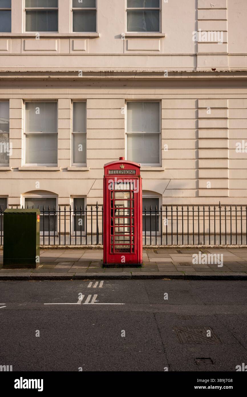 A classic British phone cabin near Hyde Park and Paddington Station in ...