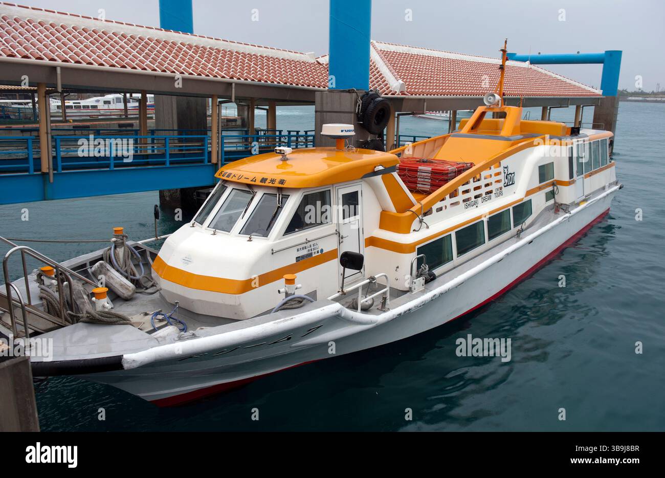 Island shuttle boat at Ishigaki harbor used for taking tourists from ...